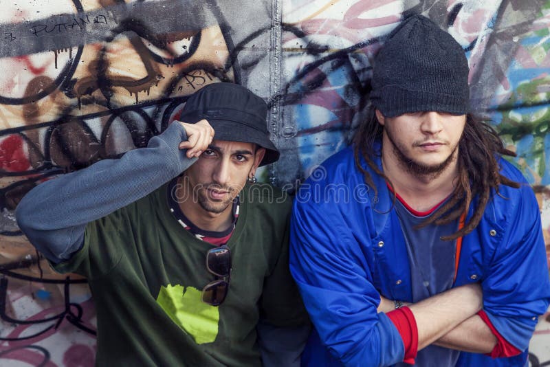 Two Rap Singers in a Subway with Graffiti in the Background Stock Photo ...