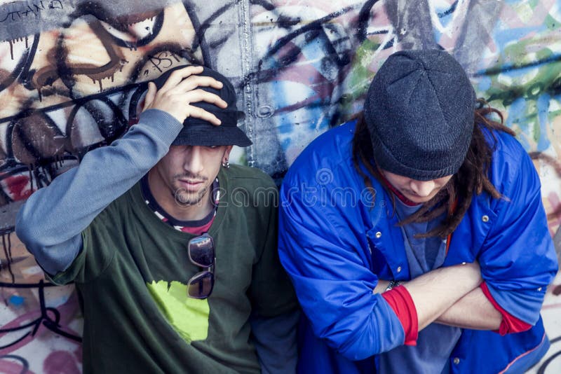 Two Rap Singers in a Subway with Graffiti in the Background Stock Image ...