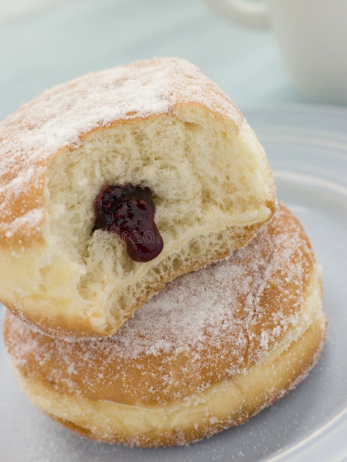 Two Raspberry Jam Doughnuts with a Bite Stock Image - Image of preserve ...