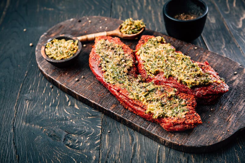 Two Raw Beef Steaks, Marinated with Herbs and Spices Stock Image ...