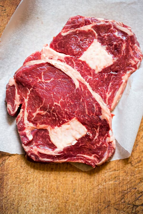 Two raw beef steaks stock image. Image of slice, meat - 91603139