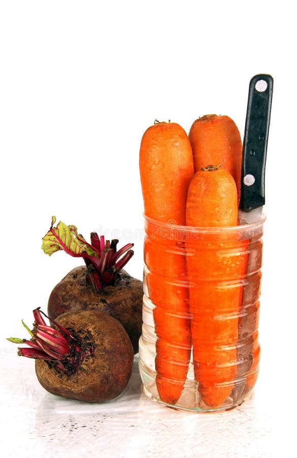 Two Raw Beets, Three Carrots and a Knife. Stock Photo - Image of ...