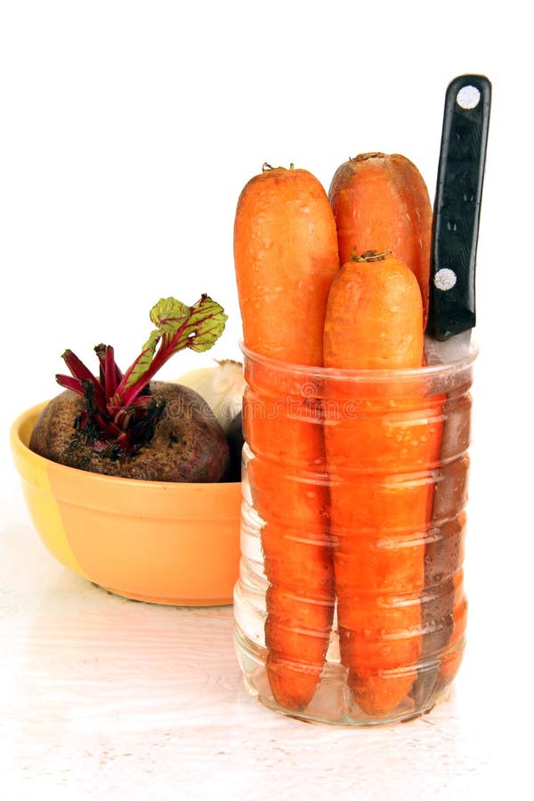 Two Raw Beets, Three Carrots, Onion and a Knife. Stock Image - Image of ...