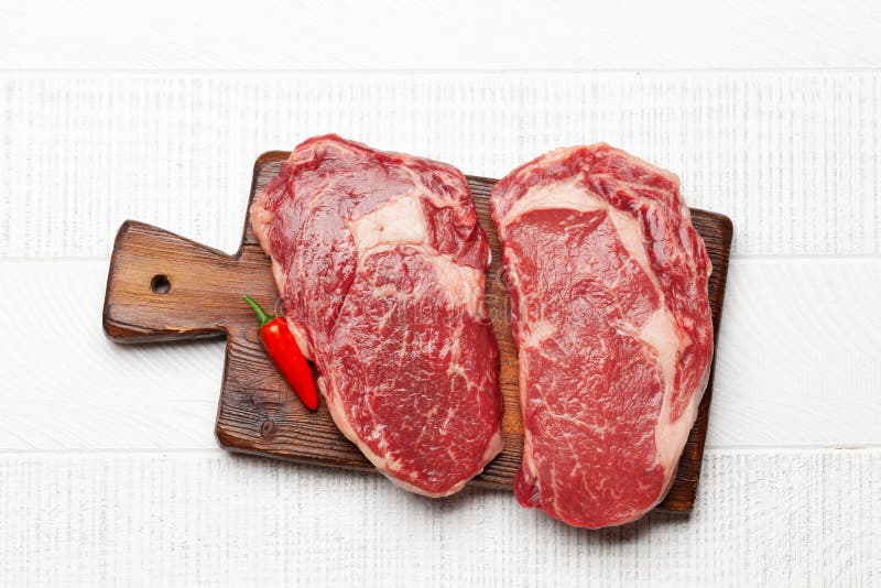 Two raw ribeye beef steaks stock image. Image of sirloin - 254743495