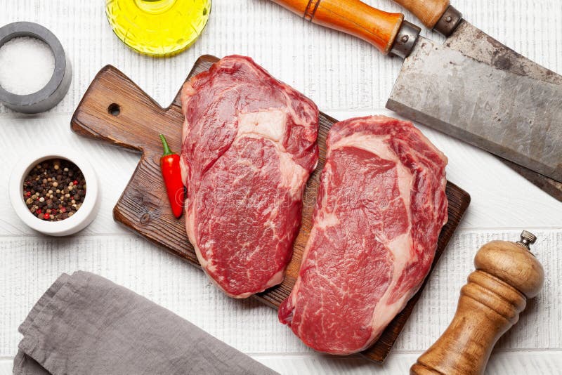 Two raw ribeye beef steaks stock image. Image of angus - 262793627