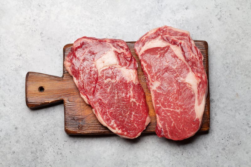 Two raw ribeye beef steaks stock image. Image of barbecue - 270618577