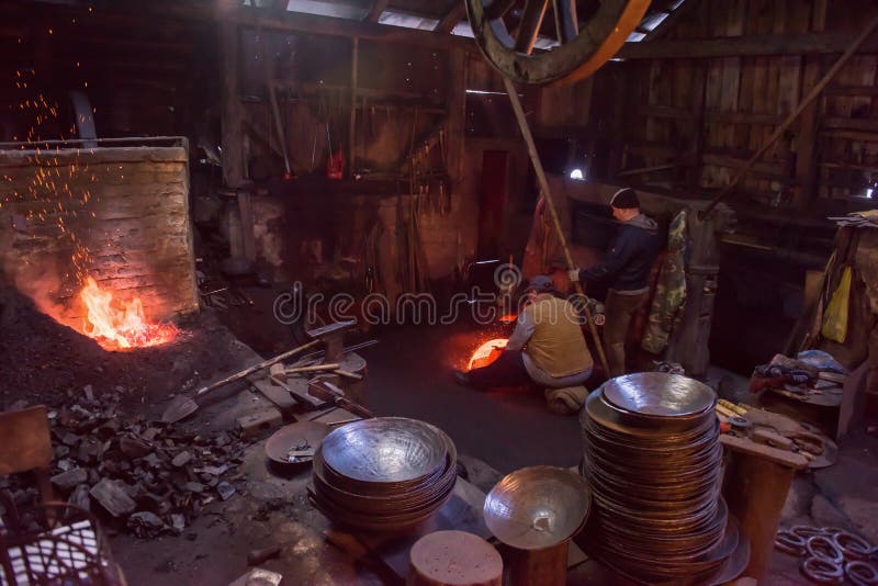 Blacksmith Workers Using Mechanical Hammer at Workshop Stock Image ...