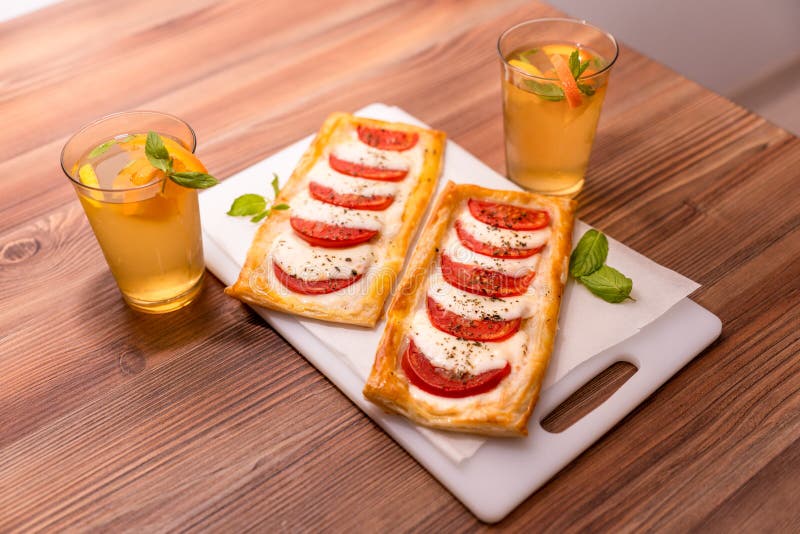 Two Rectangular Mini Pizzas with Tomatoes and Mozzarella. and Homemade ...