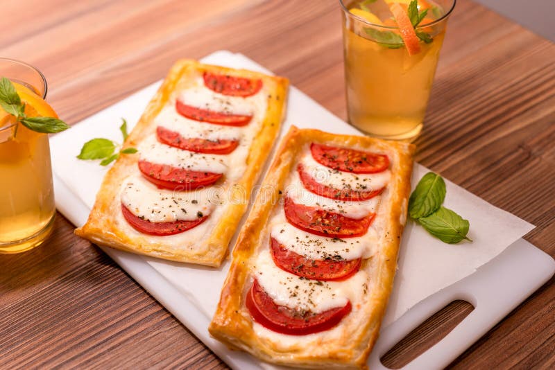 Two Rectangular Mini Pizzas with Tomatoes and Mozzarella. and Homemade ...