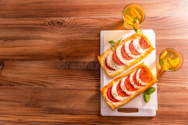 Two Rectangular Mini Pizzas with Tomatoes and Mozzarella and Homemade ...