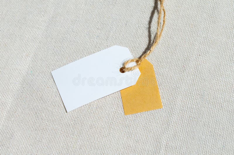 Two Rectangular Tags with a Rope on a Gray Fabric. Empty Label Mockup ...