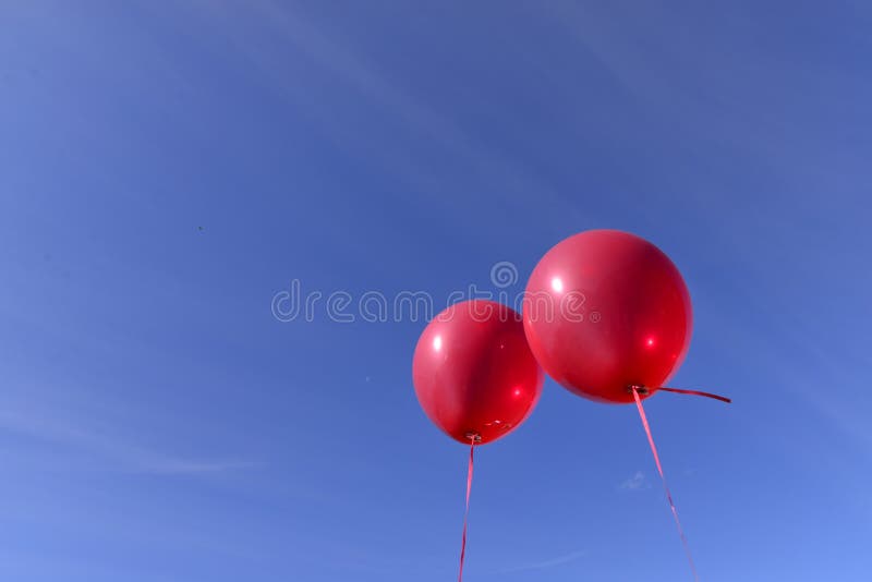 Two red balloons stock photo. Image of support, love - 88110790