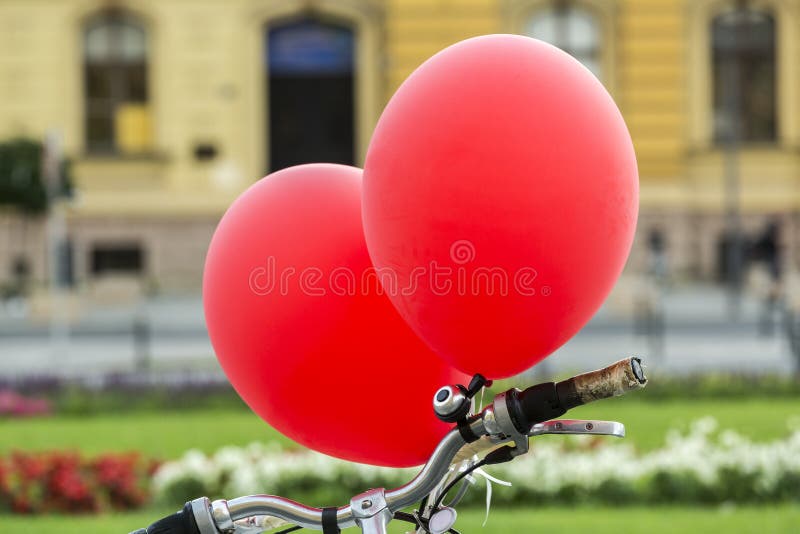 Two red balloons stock image. Image of bicycle, game - 118695347