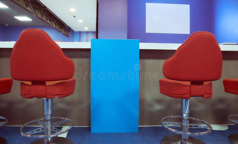 Two Red Bar Stools in a Blue Interior Stock Image - Image of modern ...