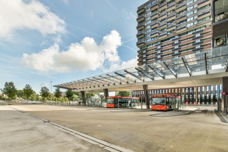 Two Red Buses Parked at a Bus Stop at a Editorial Photo - Image of ...