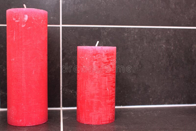 Two red candles stock image. Image of tiles, stripes - 12758185