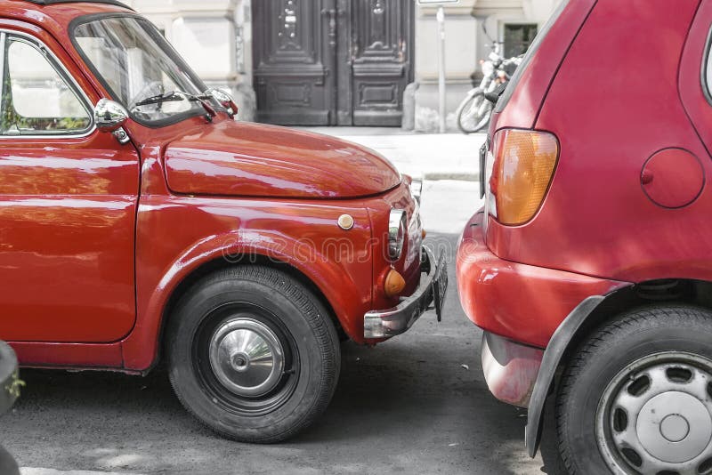 Two red car parked stock image. Image of automobile, antique - 45701765