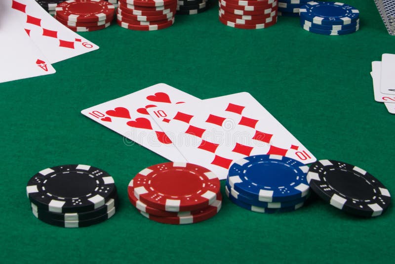 Two Red Cards with High Bet of Chips in a Game of Poker Stock Image ...