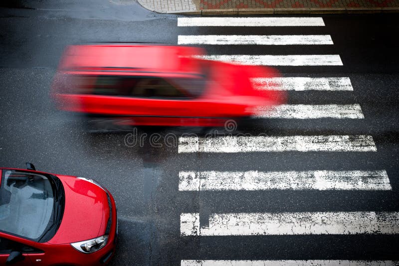 Two Red Cars on the Pedestrian Crossing Stock Photo - Image of ...