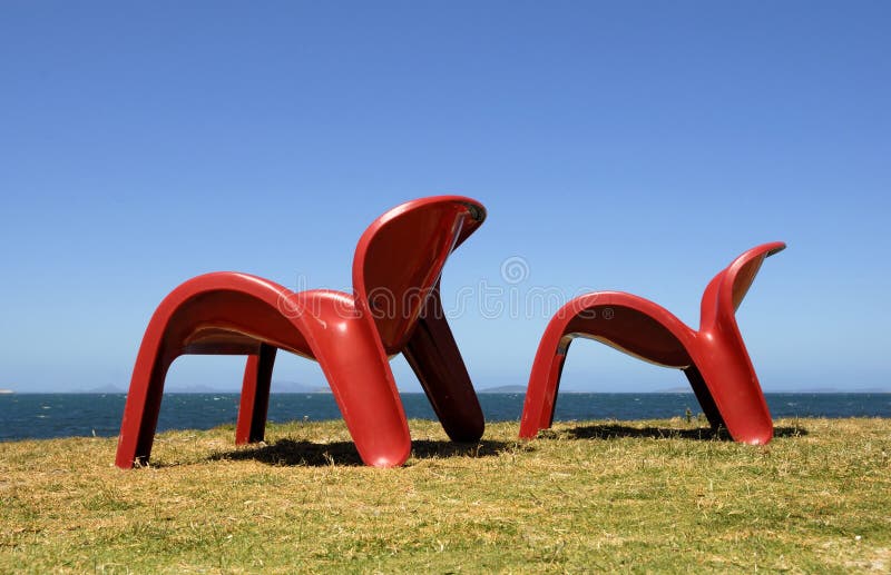 Two red chairs stock photo. Image of side, relax, blue - 4611812