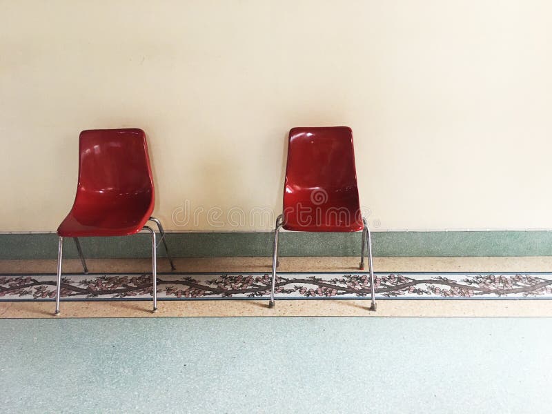 Two Red Chairs Against a White Wall Stock Photo - Image of grass, chair ...