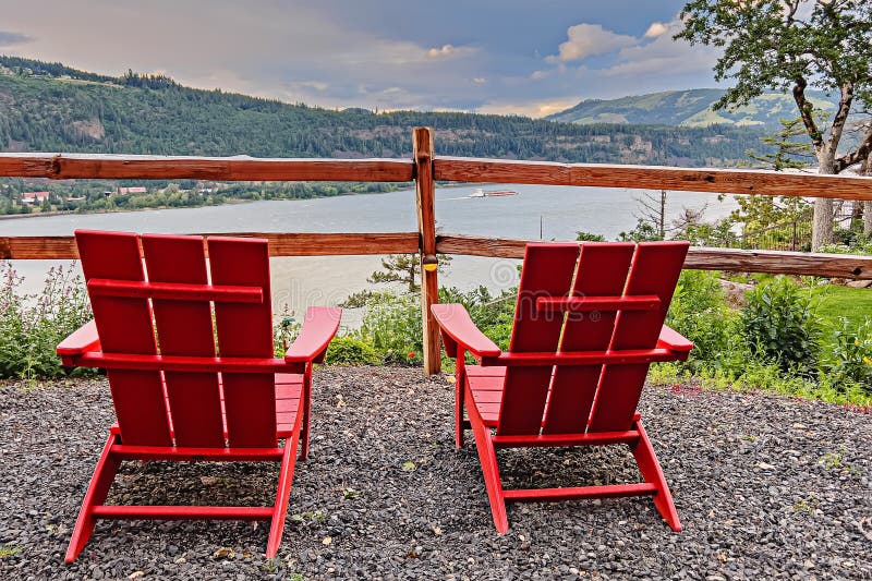 Two Red Chairs with Nobody Standing with a Beautiful View Stock Photo ...