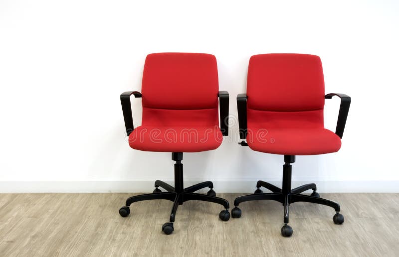 Two red chairs in office stock image. Image of symbol - 38374253