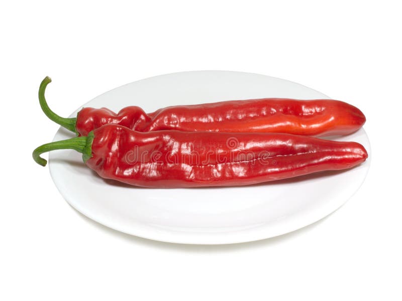 Two Red Chili Peppers on Plate Stock Image - Image of heap, macro: 25105527