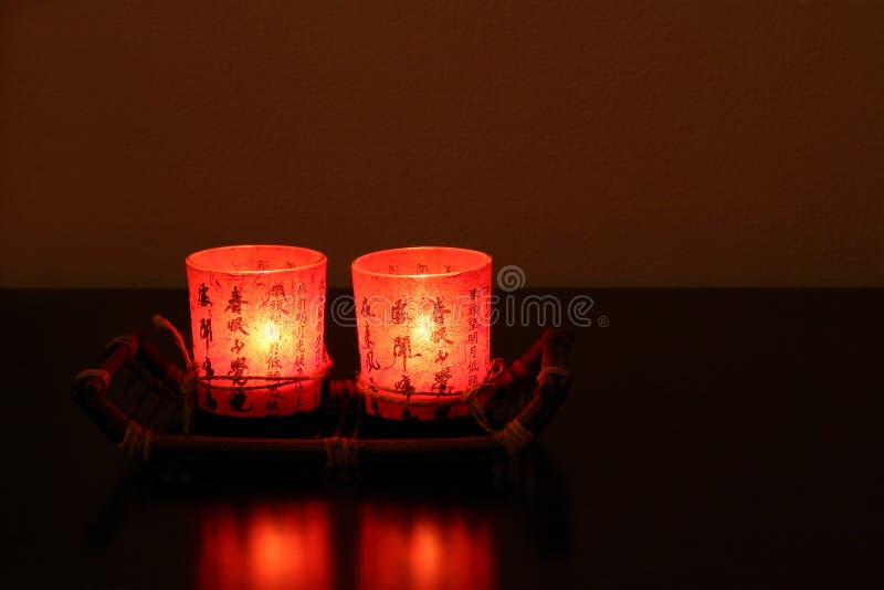 Two Red Chinese Decorative Candles in Darkness. Stock Image - Image of ...