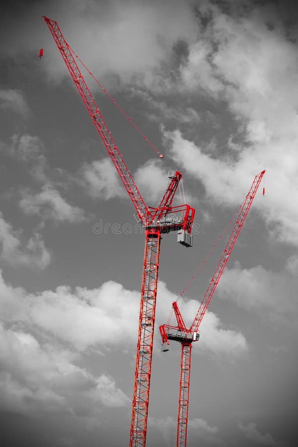 Two Red Construction Cranes Stock Image - Image of industrial ...