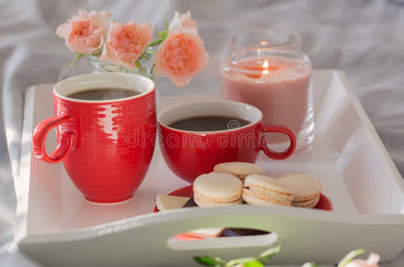 Red Cups of Coffee and Flowers on Bed Stock Image - Image of blanket ...