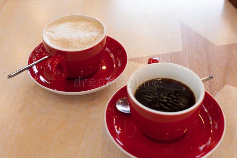 Two Red Cups of Coffee on the Table Stock Image - Image of capuccino ...