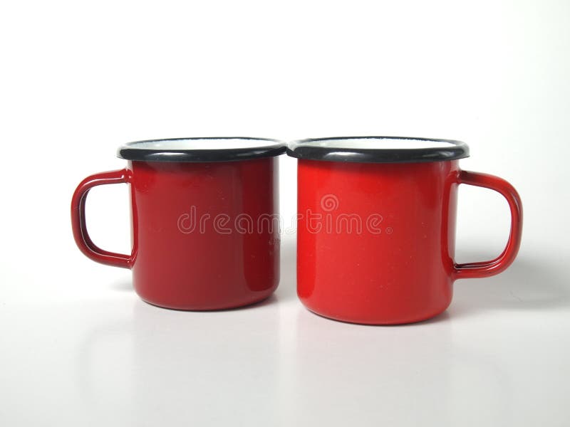 Two red cups stock image. Image of closeup, black, handles - 69655981