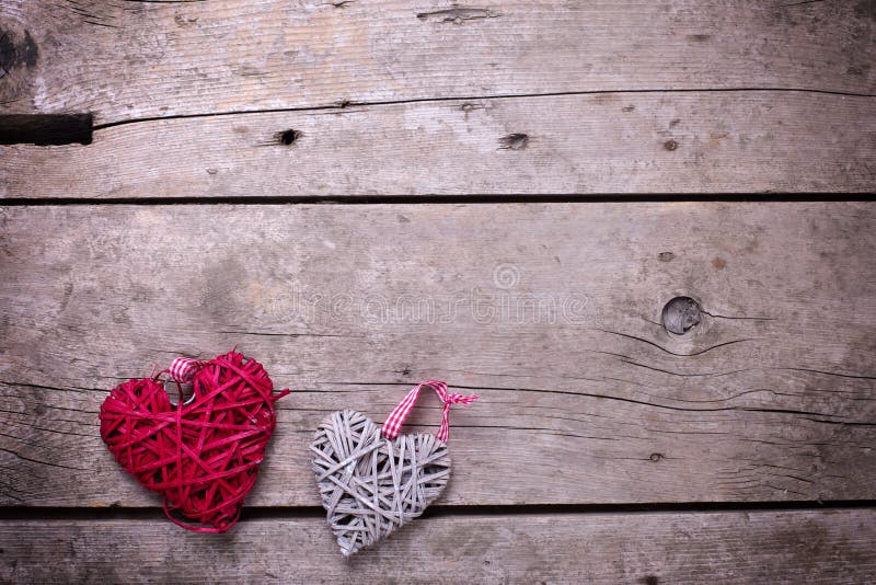 Two Red and Grey Rustic Decorative Hearts on Vintage Wooden B Stock ...