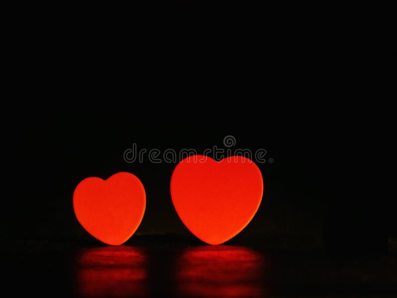 Two Red Heart on a Dark Background with Reflection, Stock Photo - Image ...