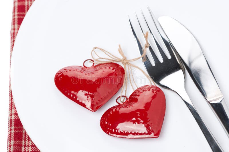 Two Red Hearts, Fork and Knife on a White Plate, Selective Focus Stock ...