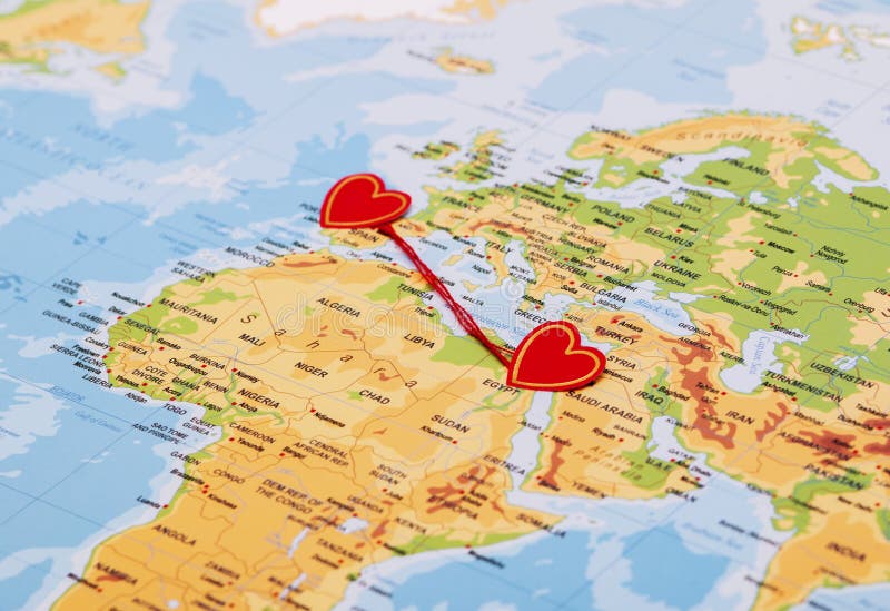 Two Red Hearts on a World Map Connected by a Red Thread Stock Image ...