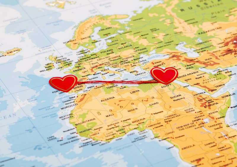 Two Red Hearts on a World Map Connected by a Red Thread Stock Image ...