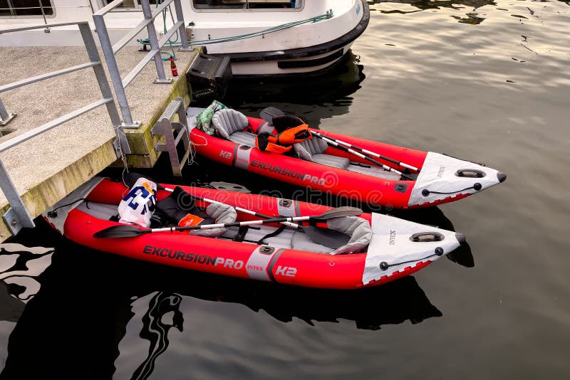 Two Red Inflatable Excursion Boats Docked at the Harbor on the Meuse ...