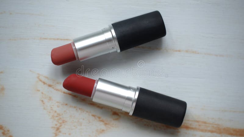 Two Red Lipsticks on a White Wooden Table Stock Photo - Image of woman ...
