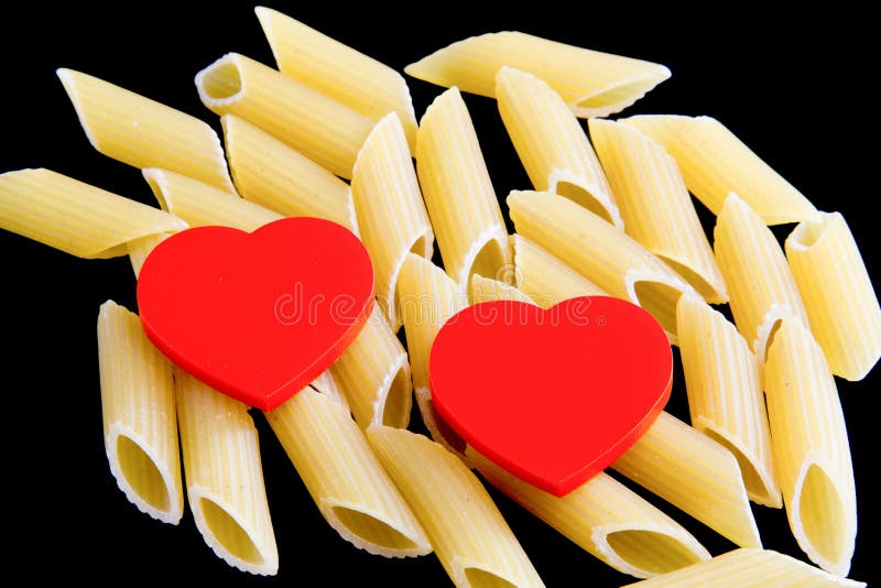 Red love hearts on pasta stock image. Image of scattered - 30282969