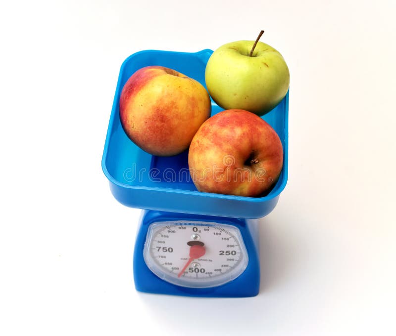 Two Red and One Green Apple on Scale Stock Image - Image of freshness ...