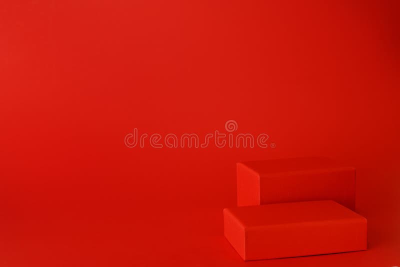Two Red Rectangular Podiums of Different Heights on Red Background ...