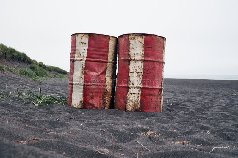 Two Red Rustick Barrels on Black Sand Beach. Kamchatka Stock Photo ...