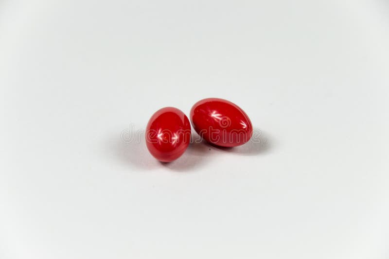 Two Red Soft Gelatine Capsules. Stock Photo - Image of pills, tablets ...