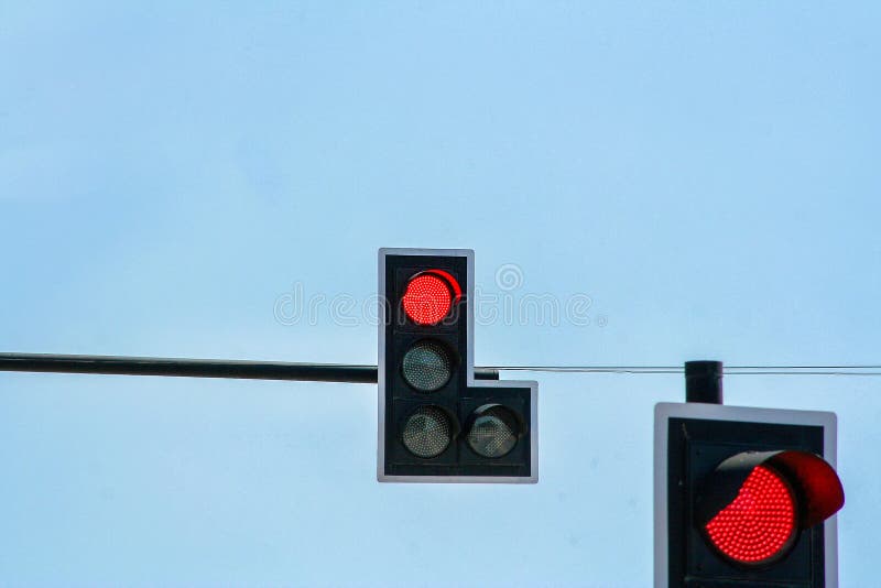 Two Red Traffic Lights on Clear Blue Sky Background Stock Image - Image ...