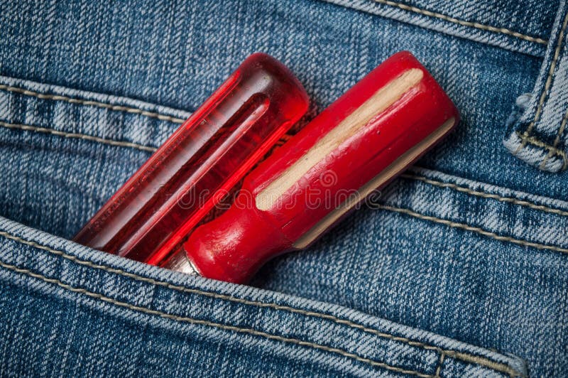 Two Red Turn in Blue Jeans Pocket Stock Photo - Image of instrument ...