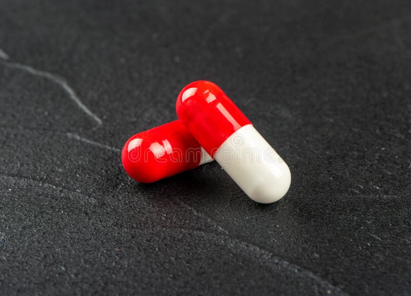Red white capsules stock photo. Image of colored, care - 140291354