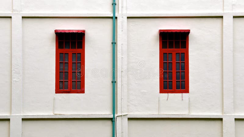 Two Red Windows on a White Stone Wall Stock Image - Image of bright ...