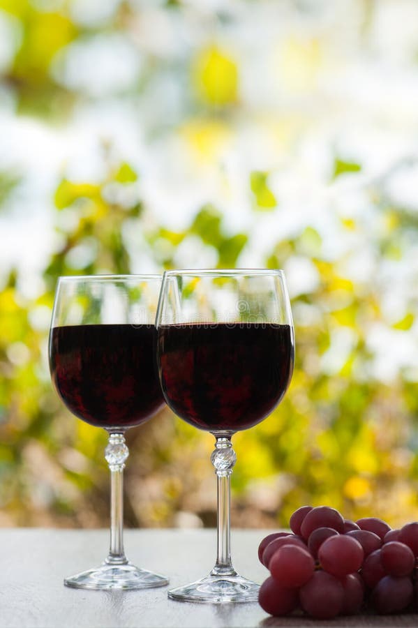 Two Red Wine Glass on Rustic Wood Surface Stock Photo - Image of ...